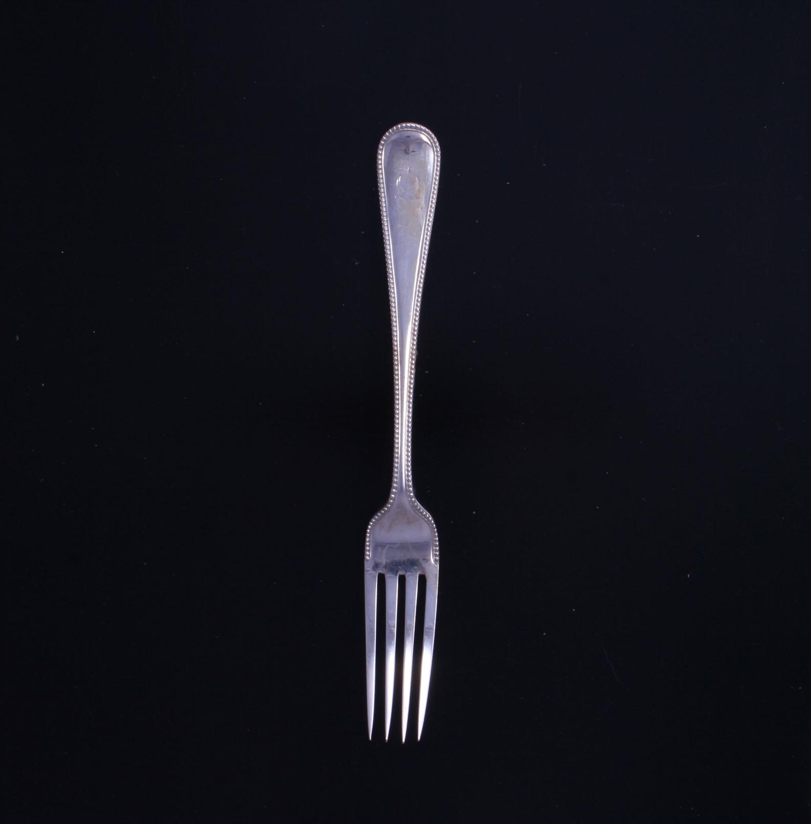 A Victorian Old English bead edge pattern sterling silver table fork ...