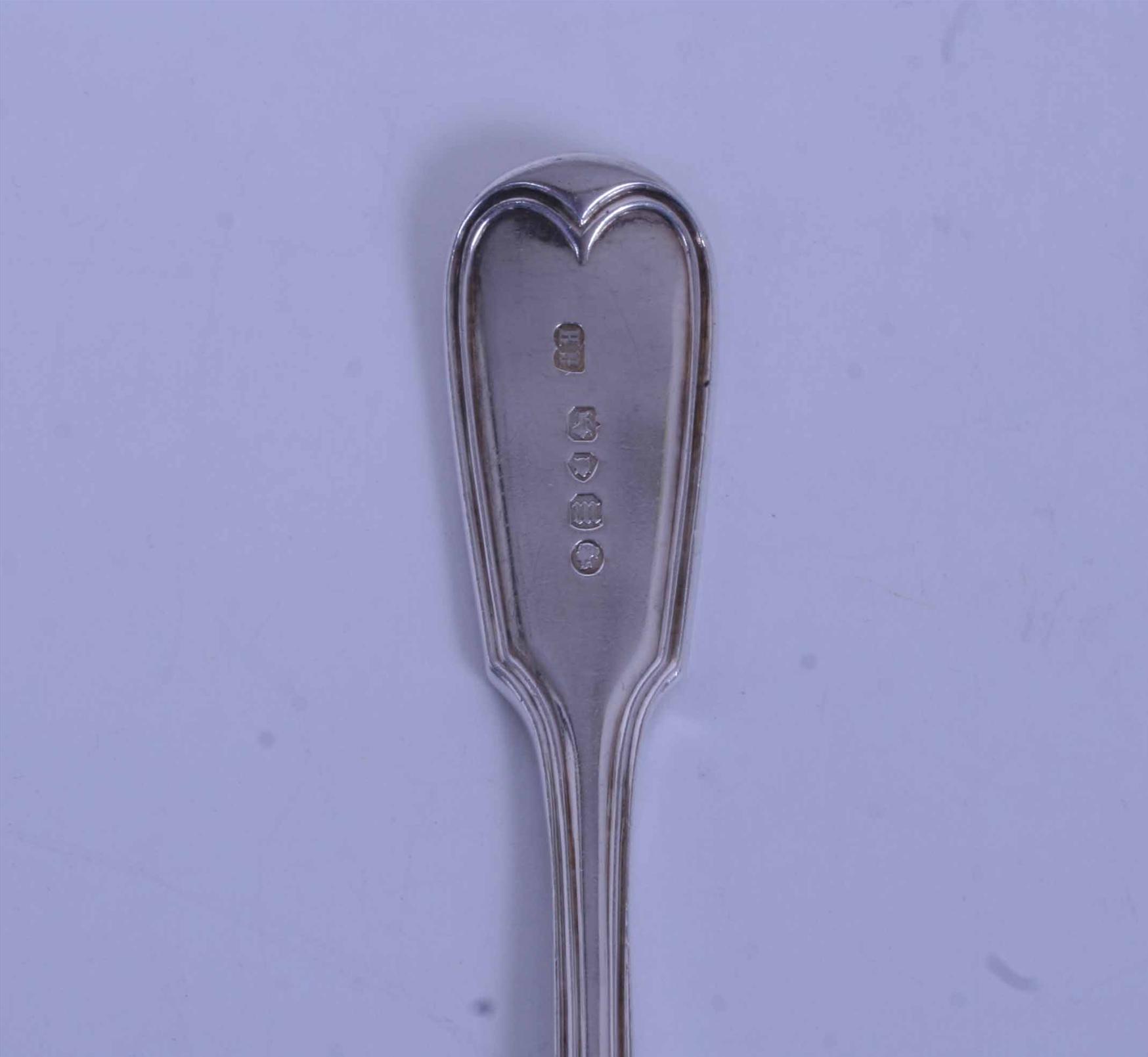 A Victorian sterling silver fiddle and thread pattern table spoon ...
