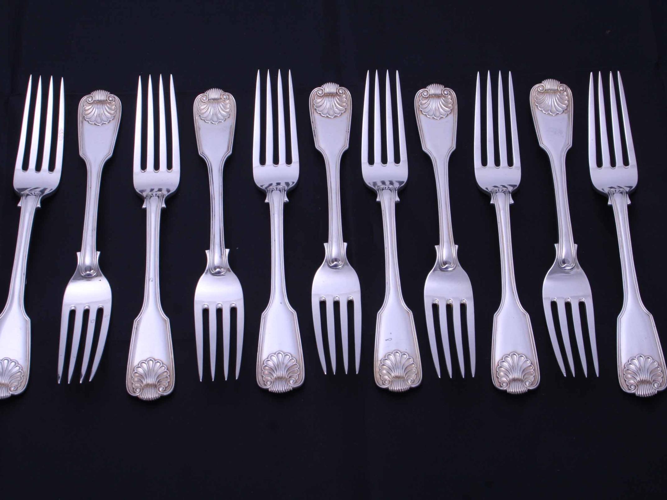 Set of eleven William IV fiddle, thread and shell pattern sterling silver table forks ...