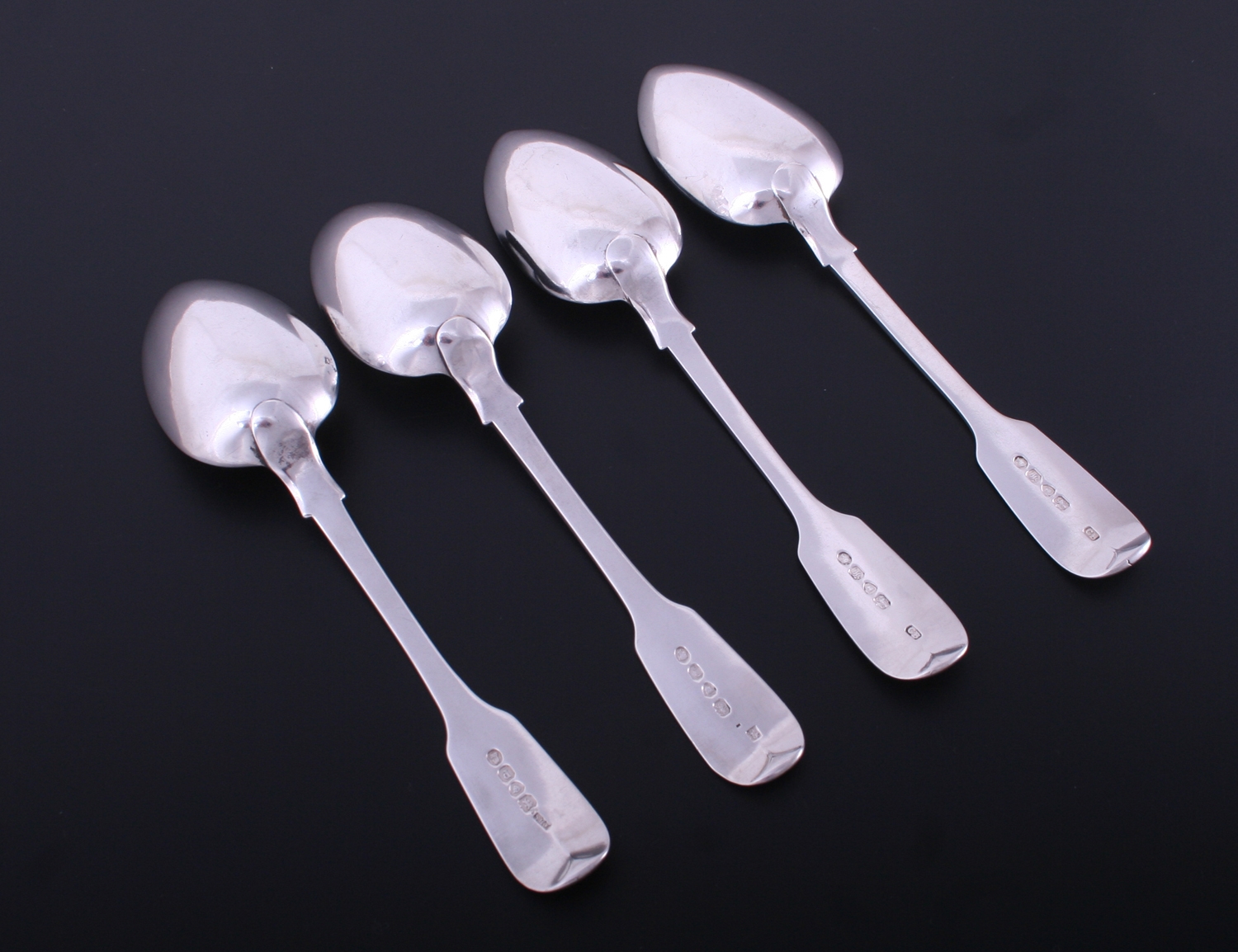 A matched set of four Victorian sterling silver fiddle pattern dessert ...