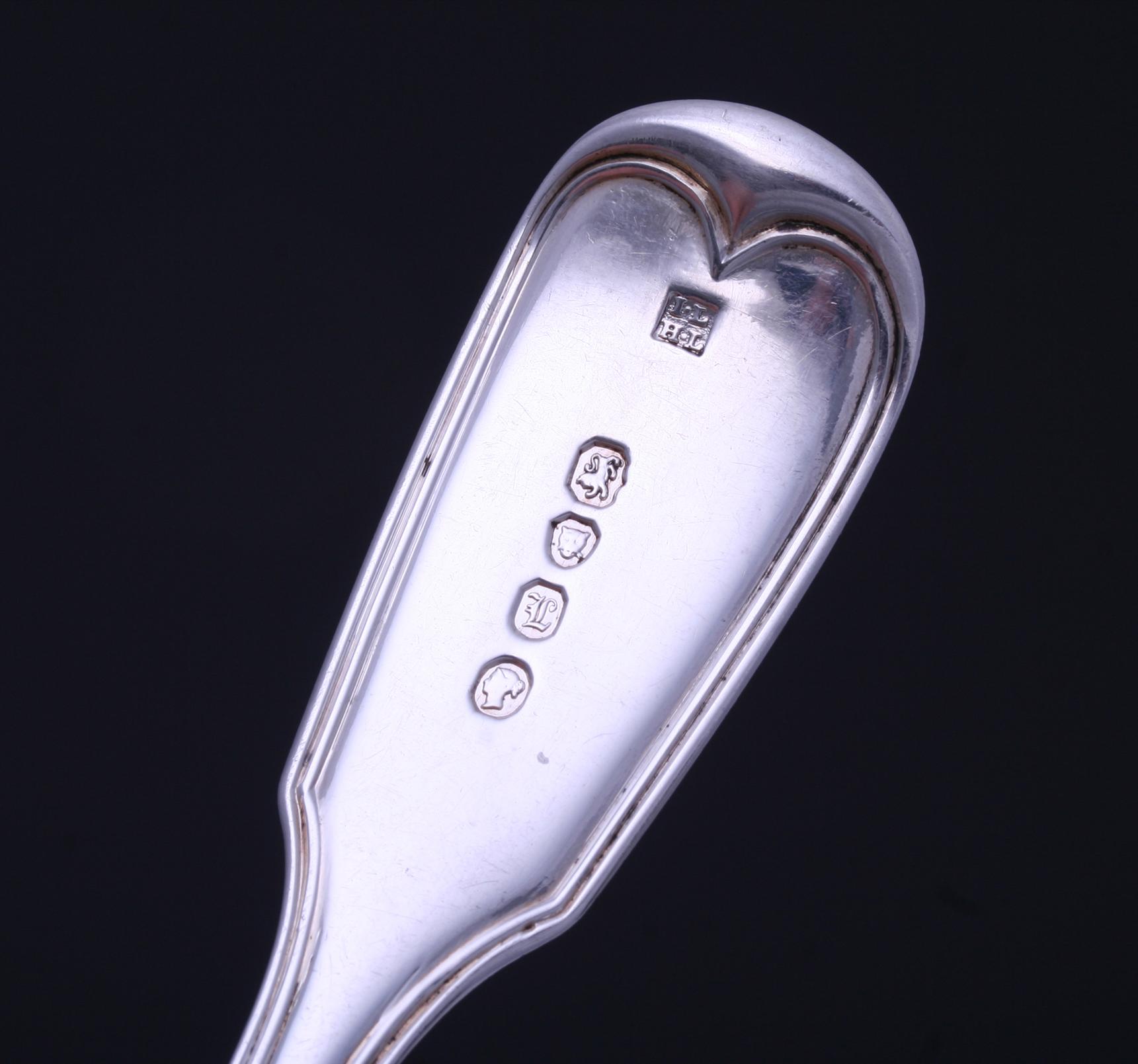 A Victorian sterling silver fiddle and thread pattern table spoon ...