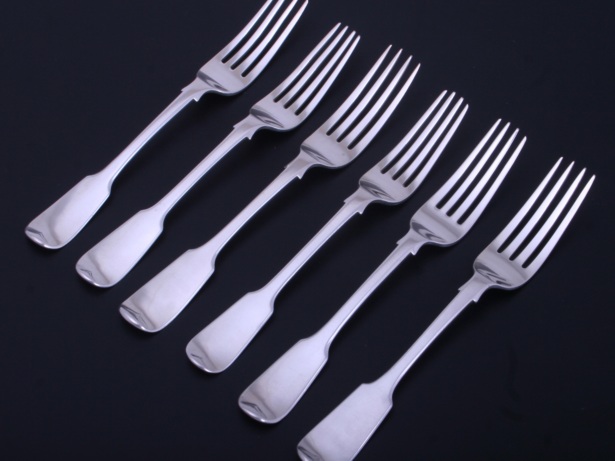 A matched set of six Victorian sterling silver fiddle pattern table ...