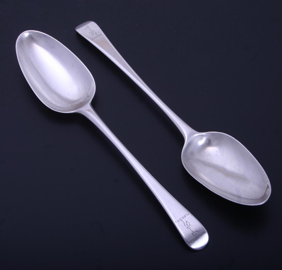 A pair of 18th Century Old English pattern sterling silver table spoons ...