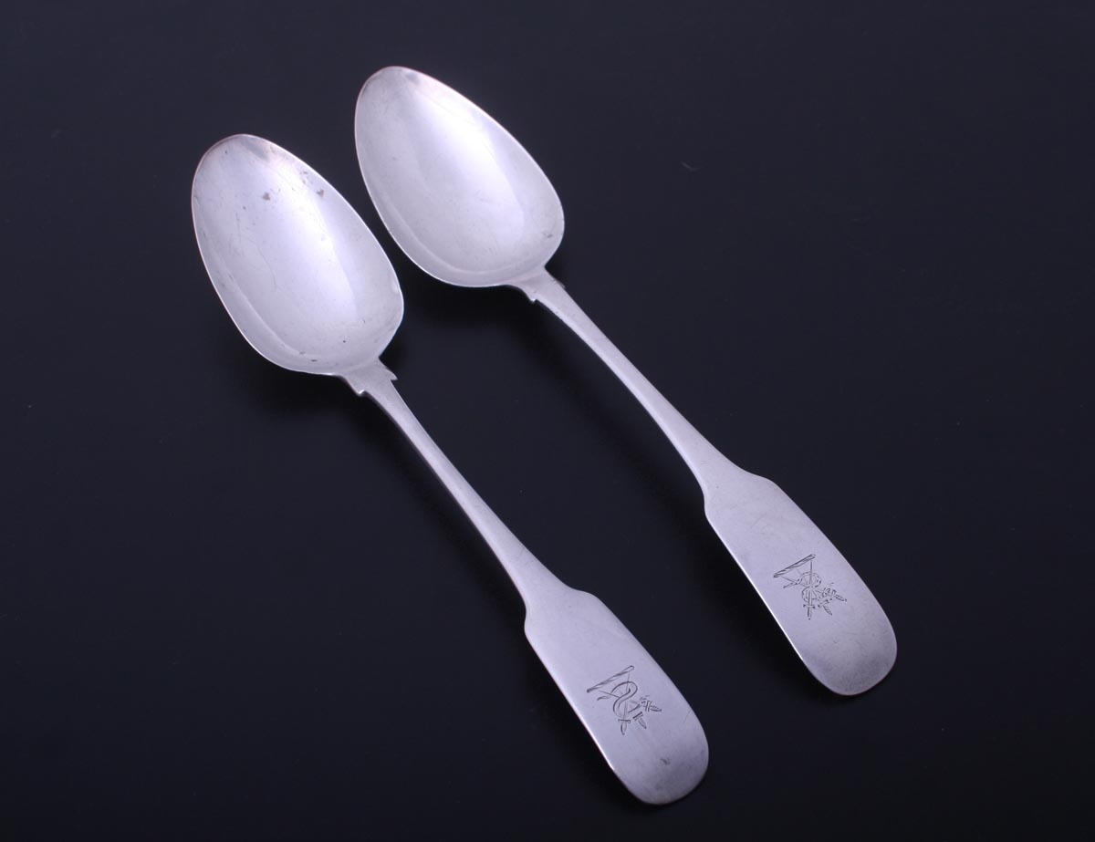 A matched pair of Regency Irish fiddle pattern sterling silver table ...