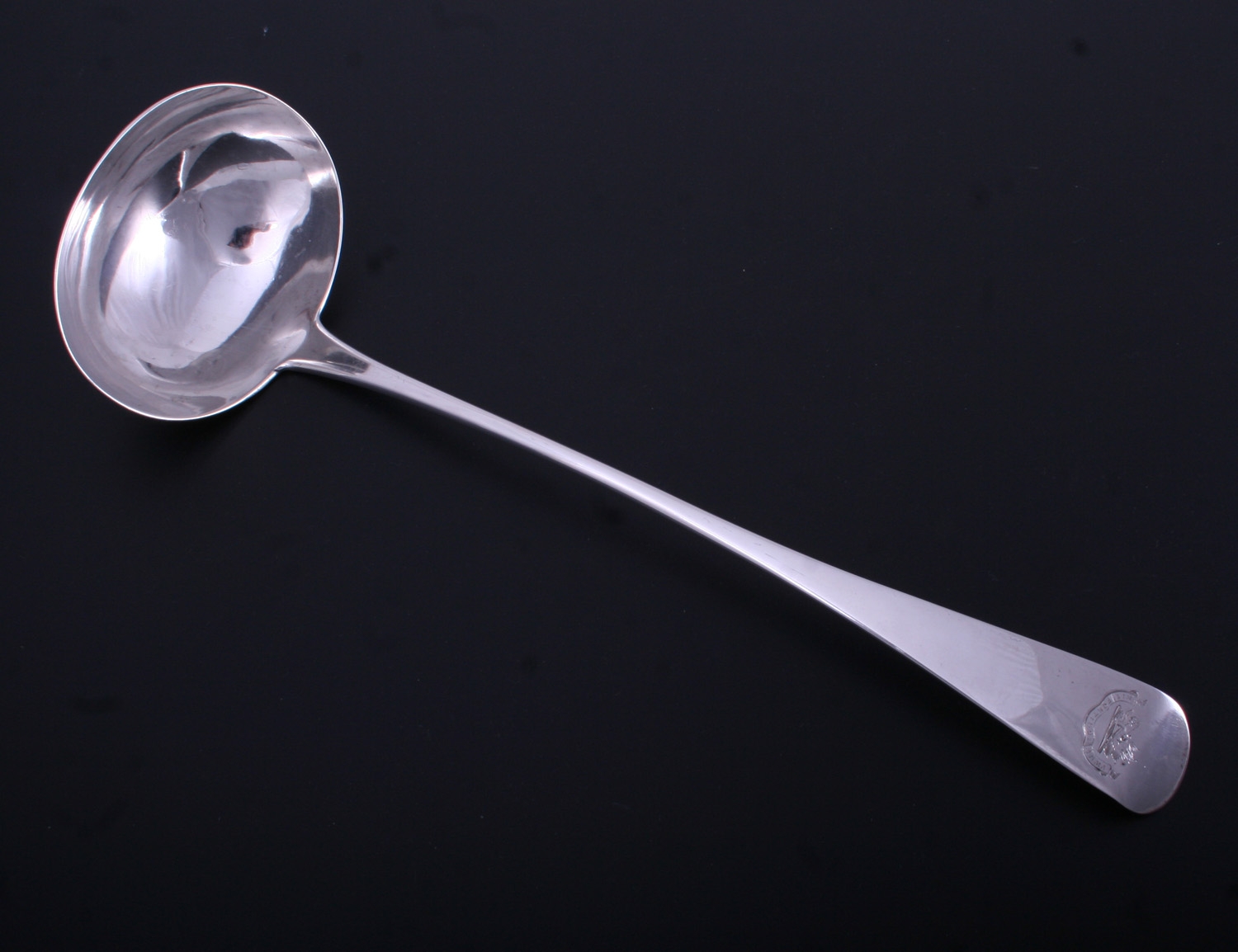A George III provincial Old English pattern silver soup ladle ...