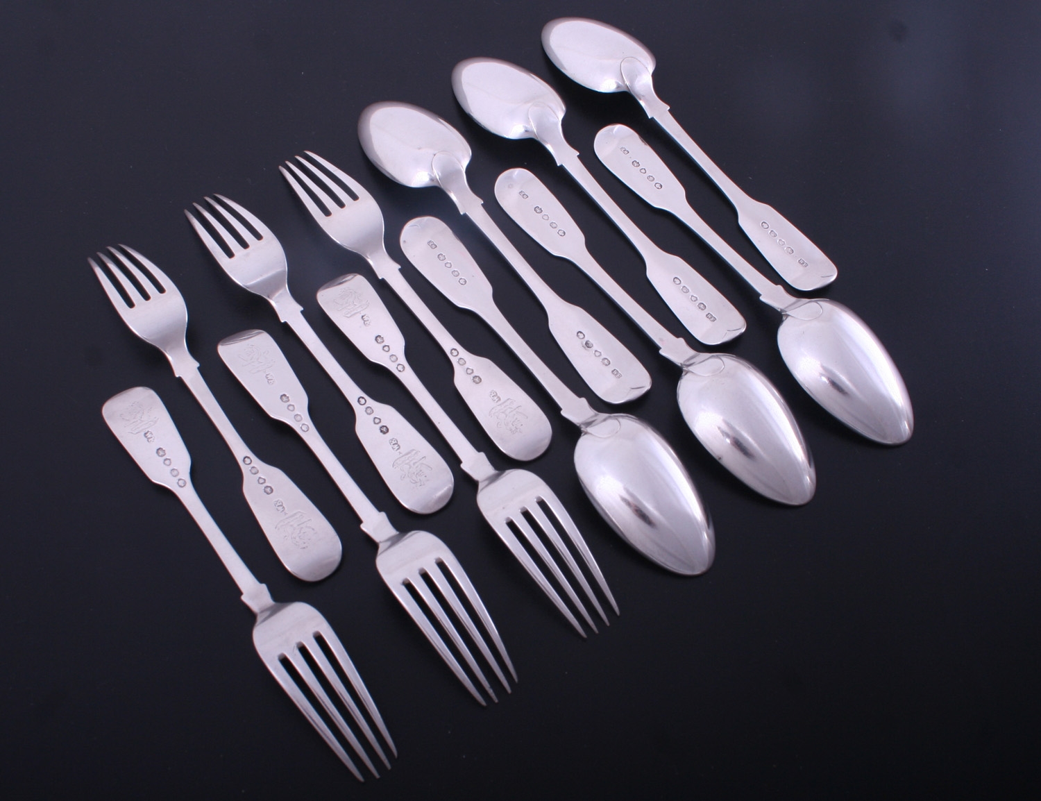 A set of Victorian fiddle pattern sterling silver dessert forks and ...