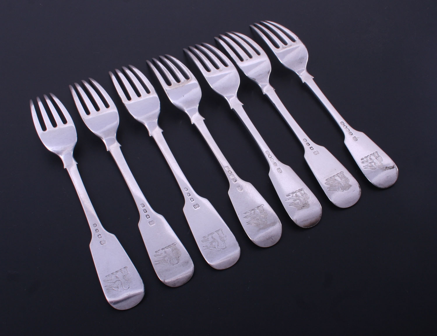 A set of seven Victorian fiddle pattern electroplated silver table ...