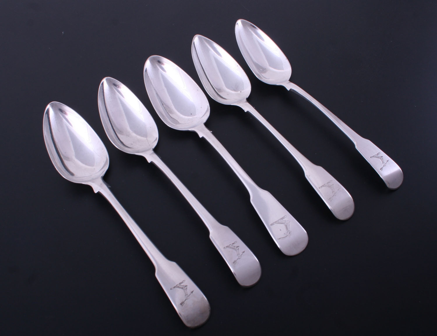 A matched set of five fiddle pattern sterling silver table spoons ...