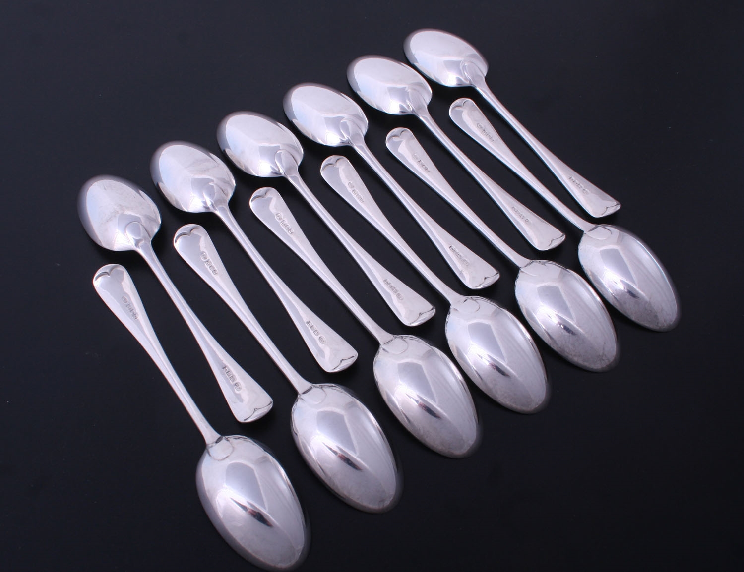 A set of twelve modern Old English pattern sterling silver dessert ...