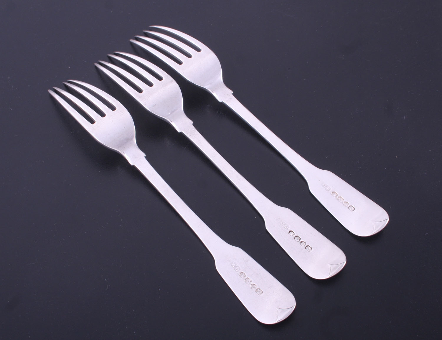 A set of three George IV fiddle pattern sterling silver table forks ...