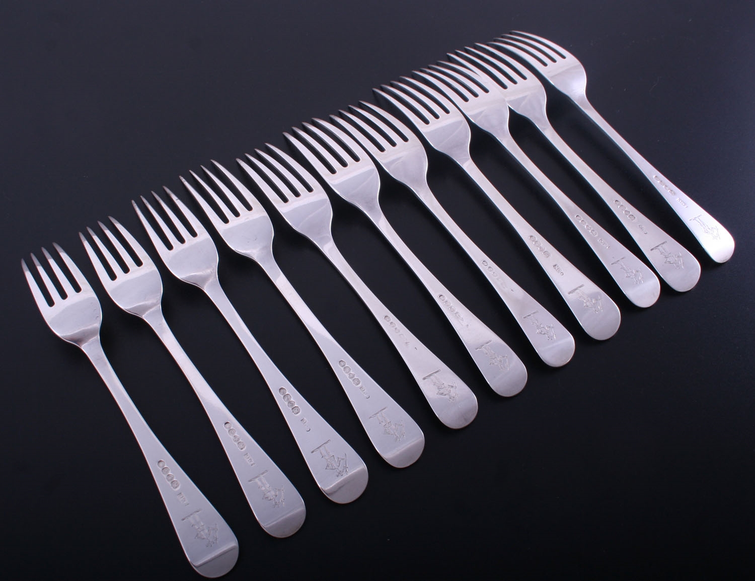 A matched set of eleven antique Old English pattern sterling silver ...