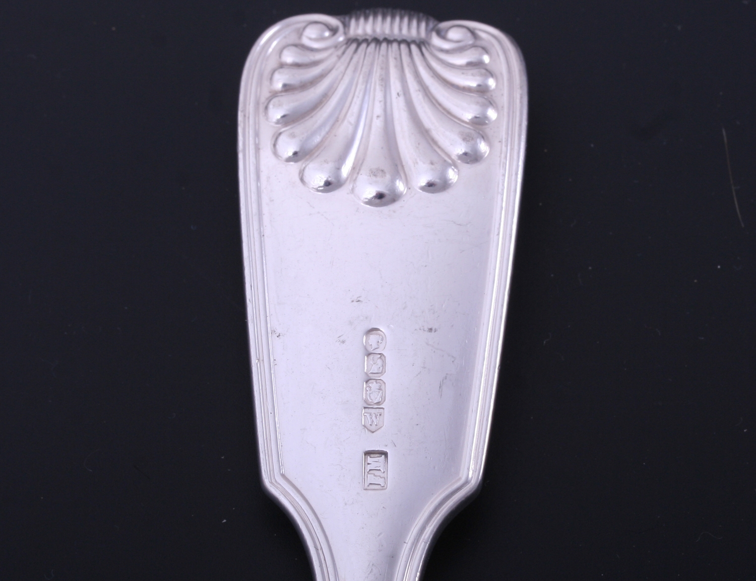 A set of twelve Irish Victorian fiddle, thread and shell pattern ...