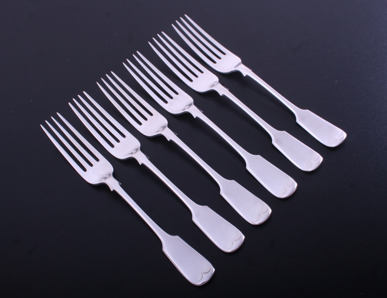 A set of six electro plate silver fiddle pattern dessert forks ...