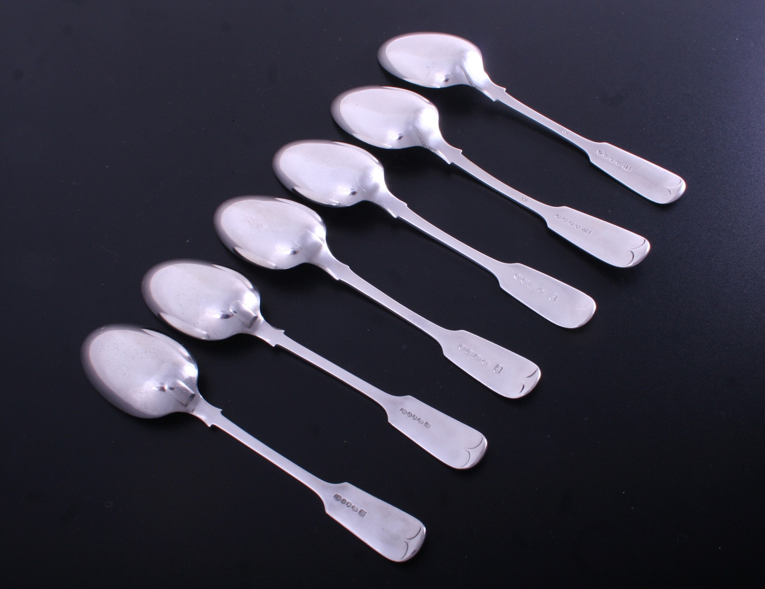 A set of six electro plate silver fiddle pattern dessert spoons ...