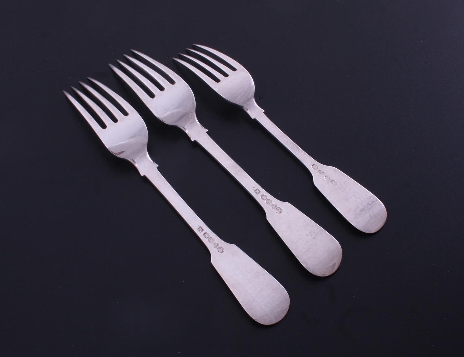 A matched set of three Victorian fiddle pattern sterling silver forks ...