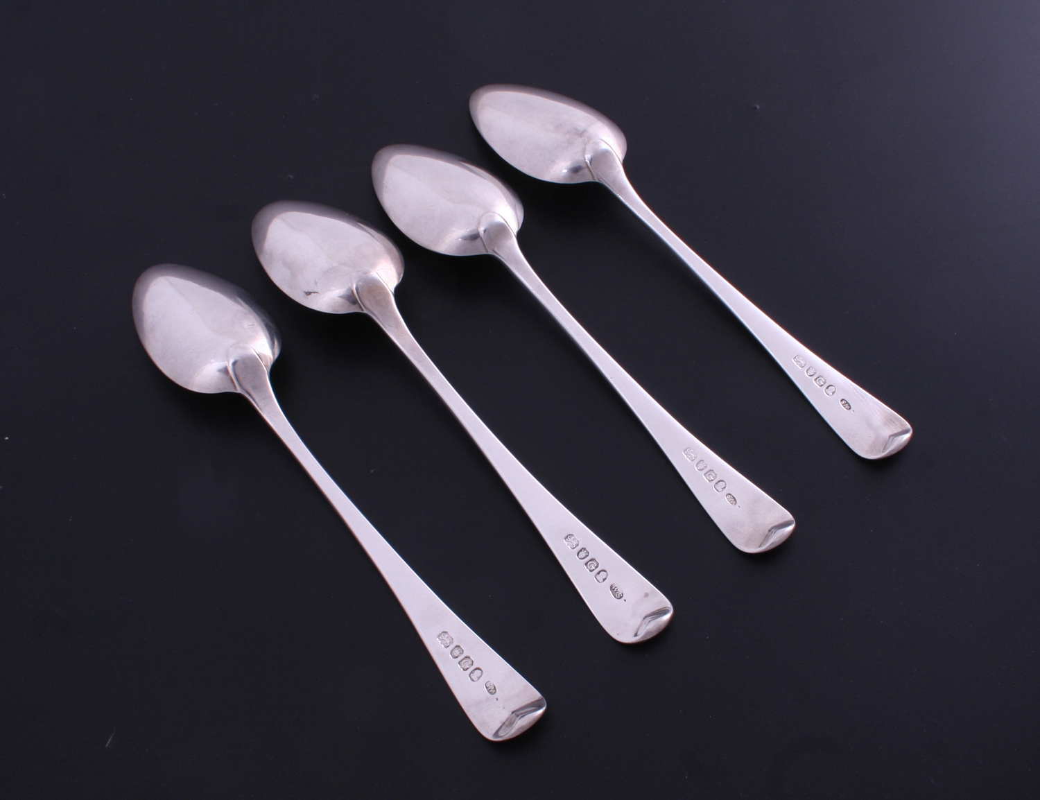 A set of four George III Old English pattern sterling silver dessert ...